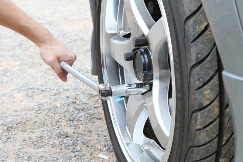 Change the wheel stock image. Image of workshop, automobile - 53937011