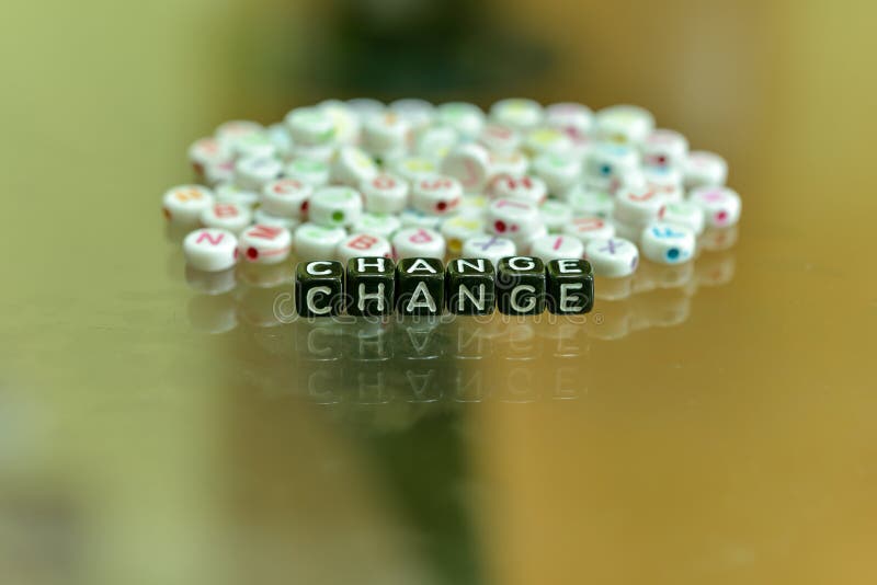 CHANGE Written with Acrylic Black Cube with White Alphabet Beads on the ...