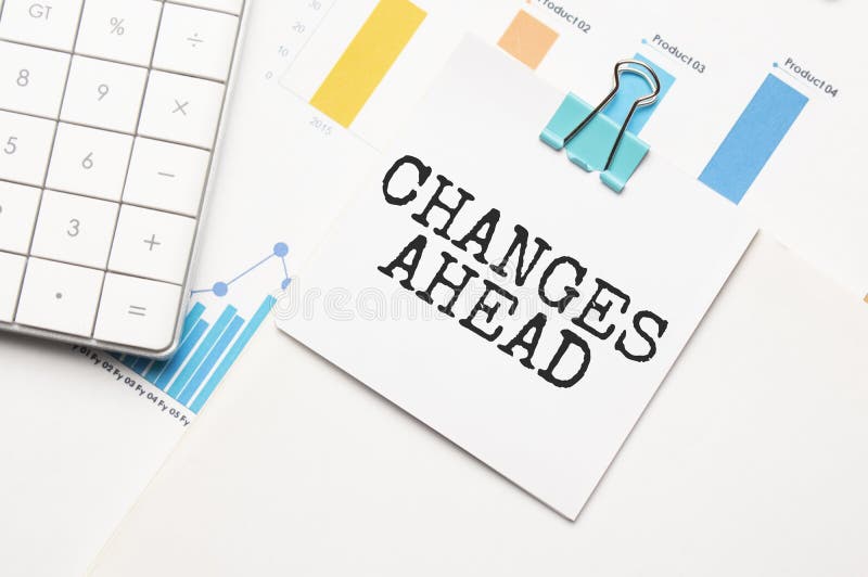Changes Ahead Text Concept. Office Workplace Table with Calculator ...