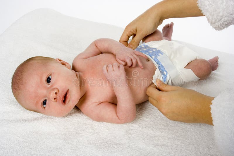 Changing the baby s nappy stock image. Image of infant - 1664499