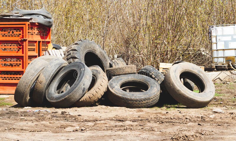 Changing Car Tires. Old Rubber Tires in the Trash. Car Dump Stock Photo ...