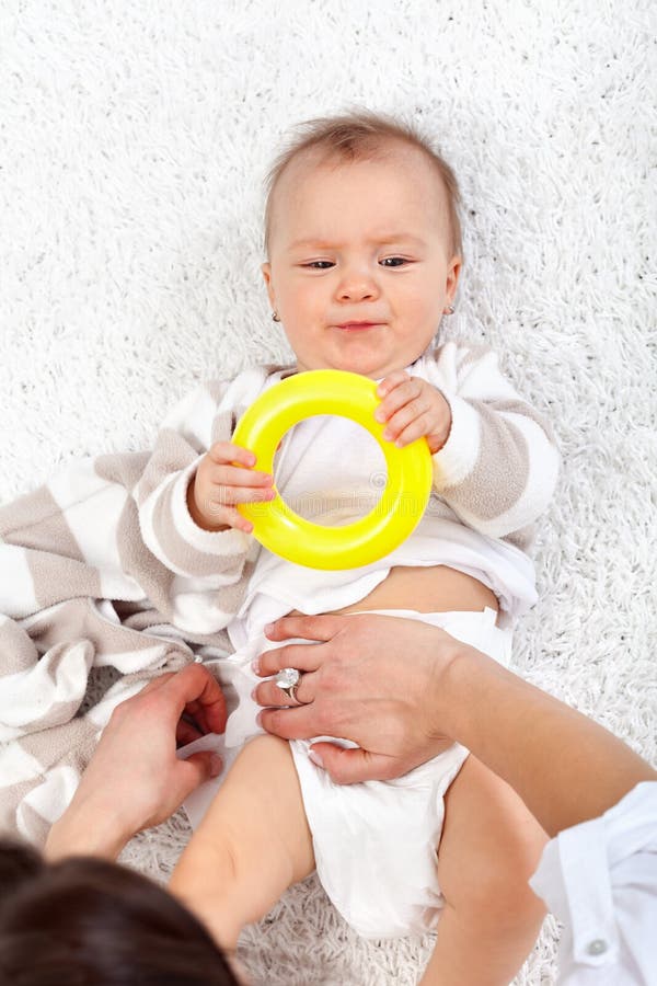 Changing Diapers on a Baby Girl Stock Image - Image of infant, adorable ...