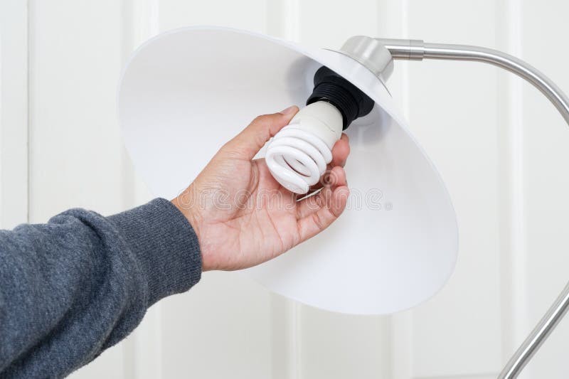 Changing light bulb stock photo. Image of electrician - 189495672