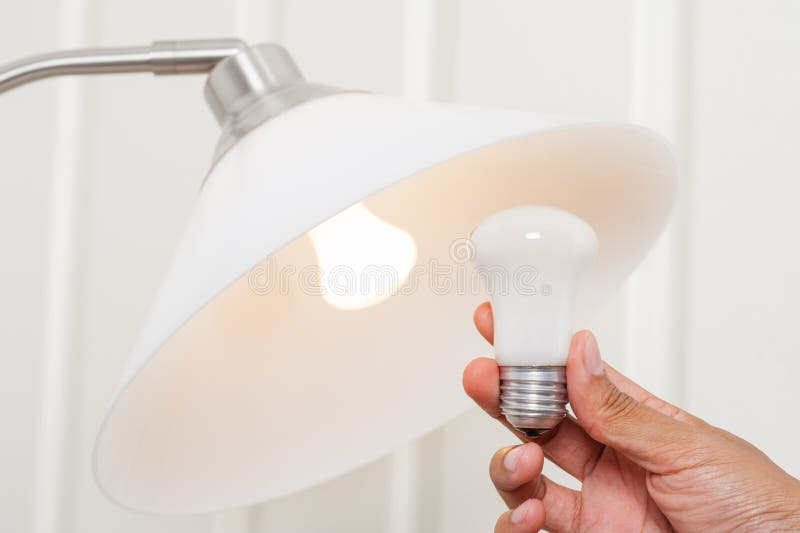 Changing light bulb stock image. Image of repairman - 189495697