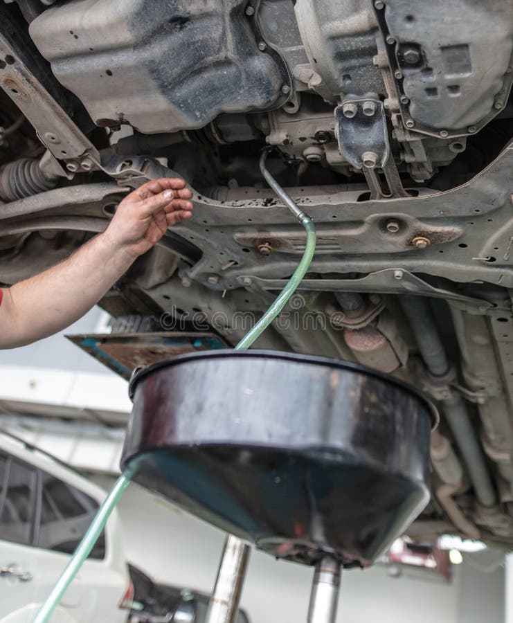 Changing the Oil in the Car Box in the Workshop Stock Image - Image of ...