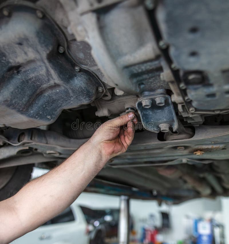 Changing the Oil in the Car Box in the Workshop Stock Image - Image of ...