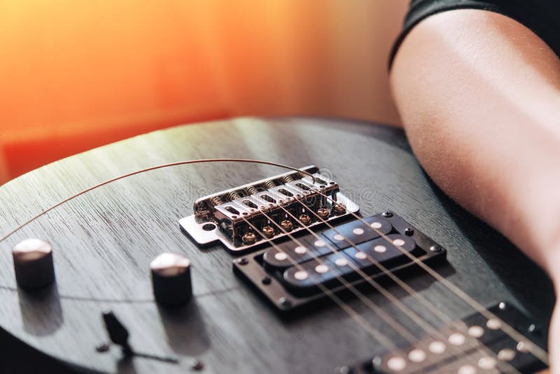 Changing Strings on an Electric Guitar. Stock Photo - Image of unwound ...