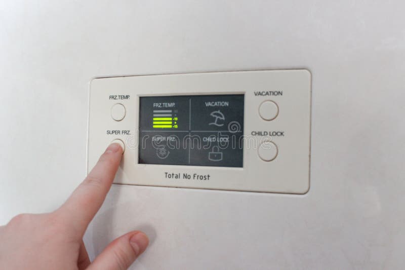 Changing Temperature on a Smart Fridge Screen at Home. Kitchen Concept ...