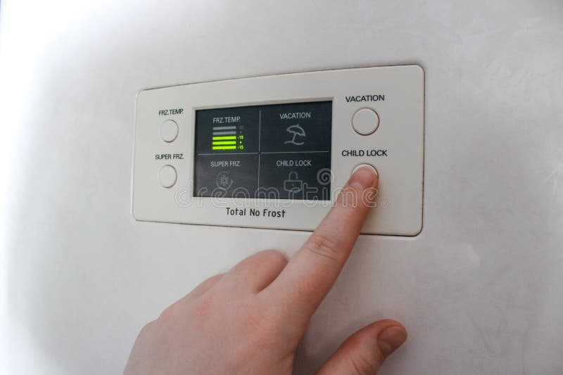 Changing Temperature on a Smart Fridge Screen at Home. Pressing Child ...