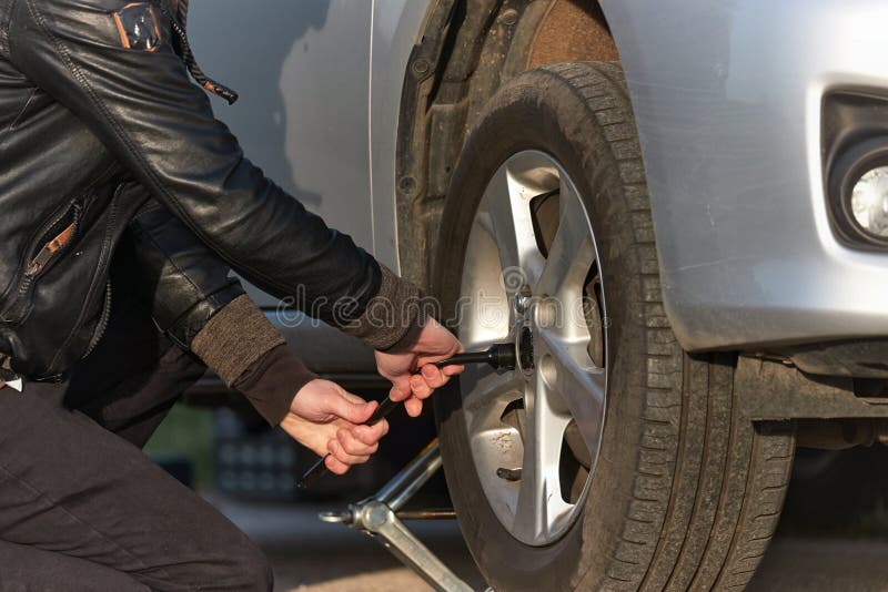 Tire Change Problems on the Road Stock Photo - Image of skillful ...