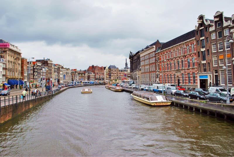 Channel In Amsterdam In Autumn Sunlight. Boat Floating Tree-lined Canal ...