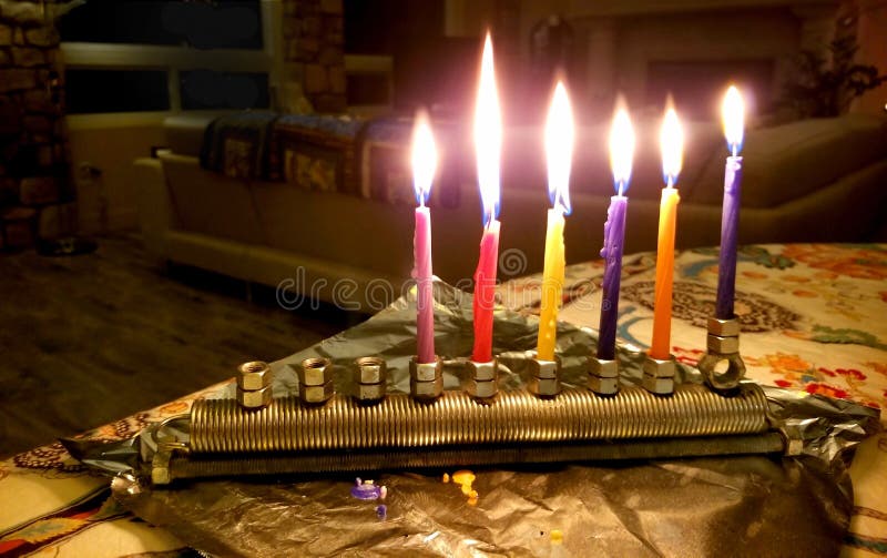 Chanukah Candles in a Modern Metal Menorah Stock Photo - Image of ...