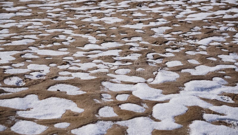 Chaotic Snow Spots on the Beach in Winter Stock Photo - Image of ...