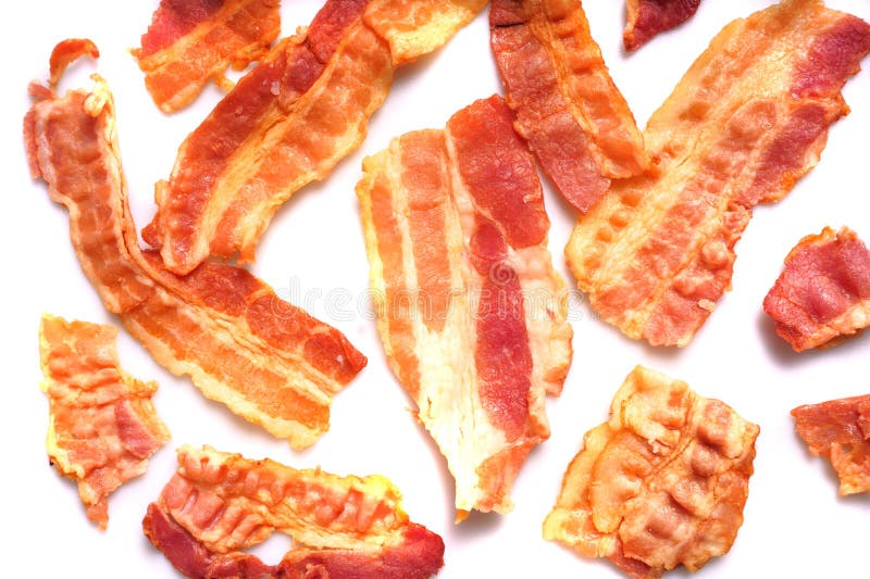 Chaotically Scattered Pieces of Dried Bacon on a White Background are ...