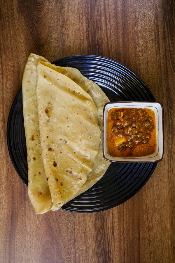 Chapati with Chicken Curry Mix with Sardine Sambal Stock Photo - Image ...