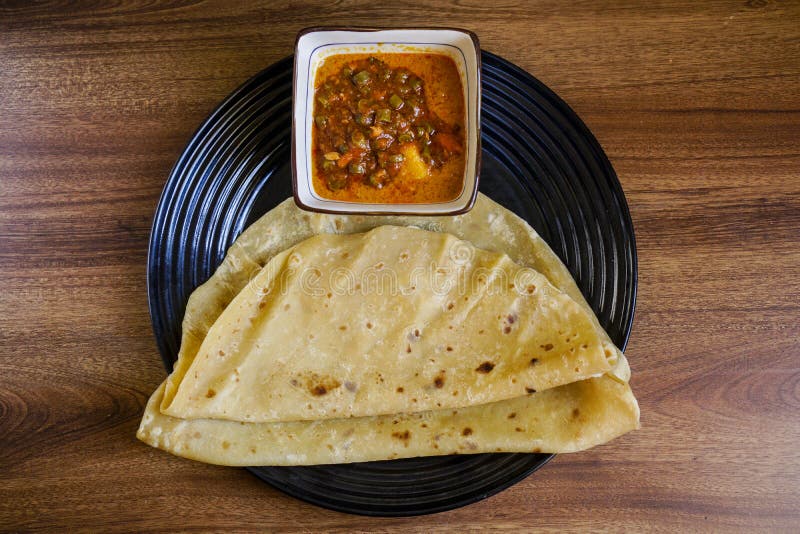 Chapati with Chicken Curry Mix with Sardine Sambal Stock Photo - Image ...