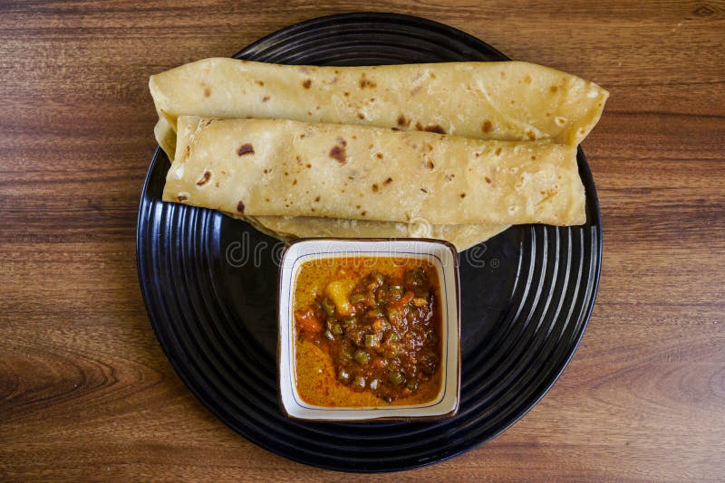 Chapati with Chicken Curry Mix with Sardine Sambal Stock Photo - Image ...