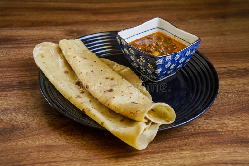 Chapati with Chicken Curry Mix with Sardine Sambal Stock Image - Image ...