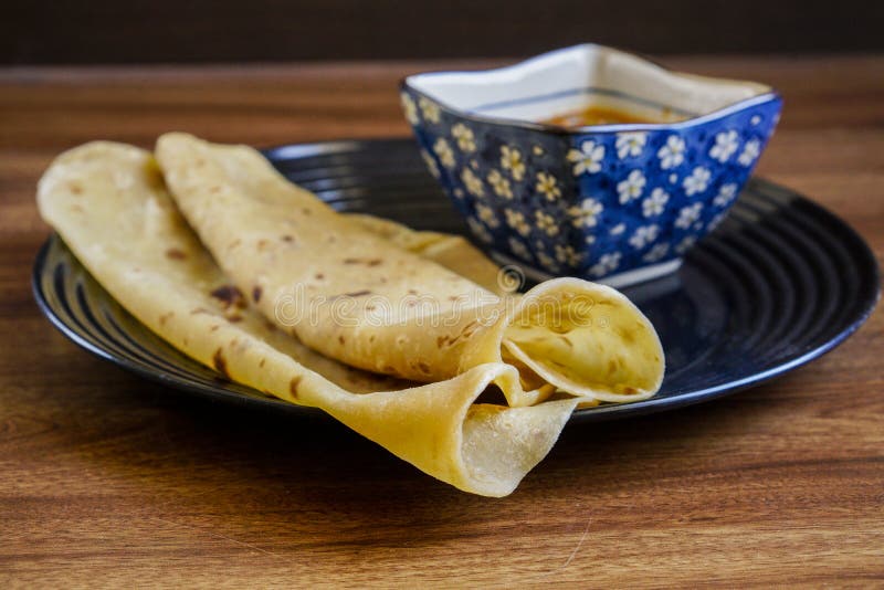 Chapati with Chicken Curry Mix with Sardine Sambal Stock Image - Image ...