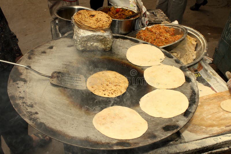 Chapati cooking stock photo. Image of chapati, cook, bread - 13933844