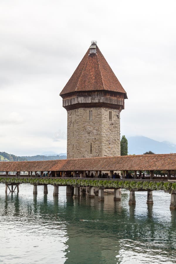Chapel Bridge and Water Tower in Luzern, Switzerland. Editorial Stock ...