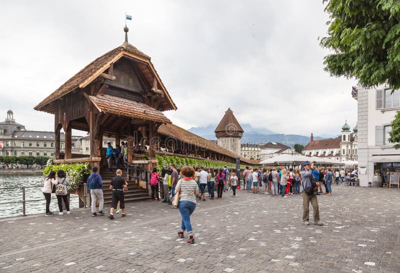 Chapel Bridge and Water Tower in Luzern, Switzerland. Editorial Stock ...