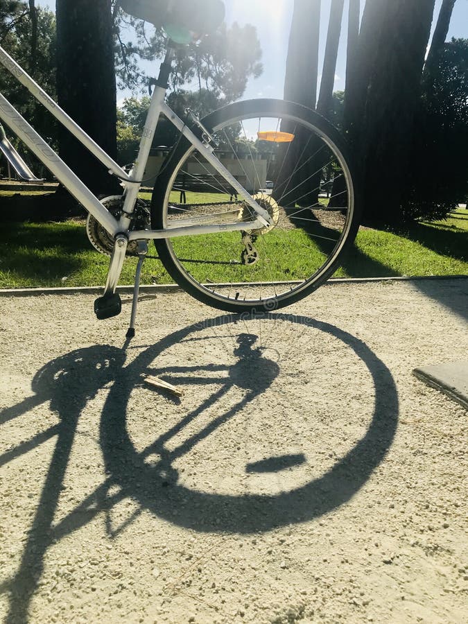 The Character `eight` Formed by a Bicycle Wheel and a Shadow. Stock ...