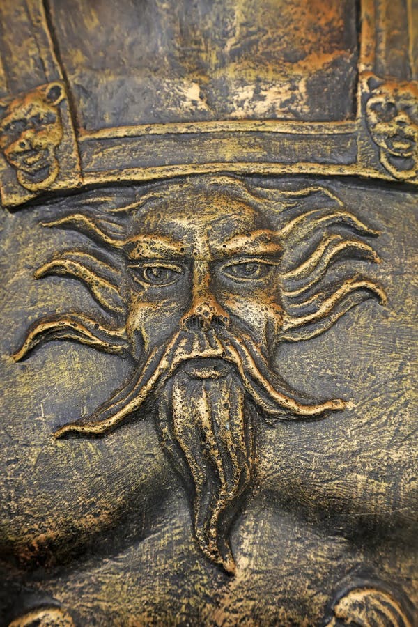 Character Faces on Copper Metal Plates Stock Image - Image of ancient ...