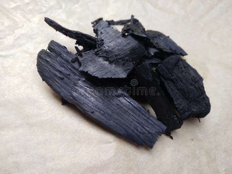 Charcoal from Burning Wood. Shiny Black in Color with a Brittle Texture ...
