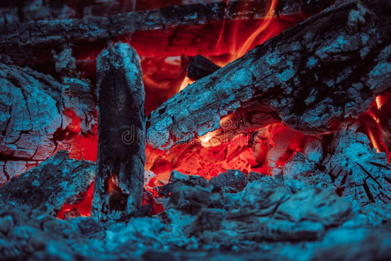 Charcoal and Logs Covered with Ash Burning with Bright Red Fire in ...