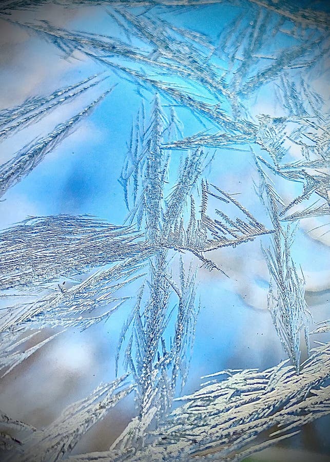 Chards of Ice Formation on Window and a Blue Frost Stock Photo - Image ...