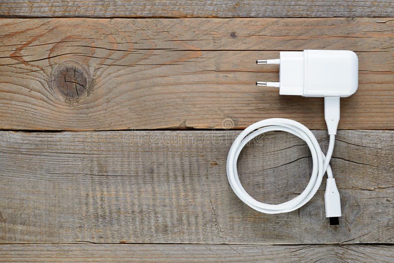 Charger for Smartphone or Tablet on Table Stock Image - Image of copy ...