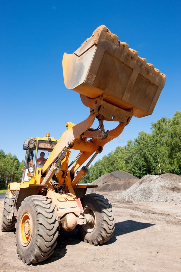 Camion De Dumper De Charge De Machine De Chargeur De Roue Photo stock ...