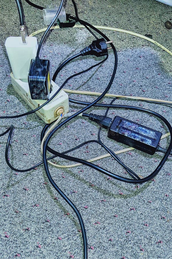 Charging Cables are a Tangled Mess Stock Photo - Image of energy ...