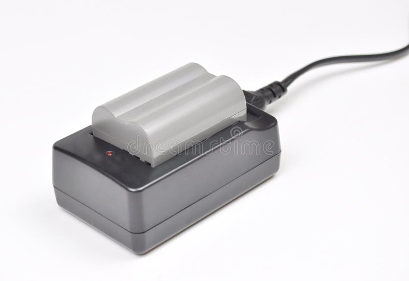 Camera battery charger stock image. Image of lithium - 66372367