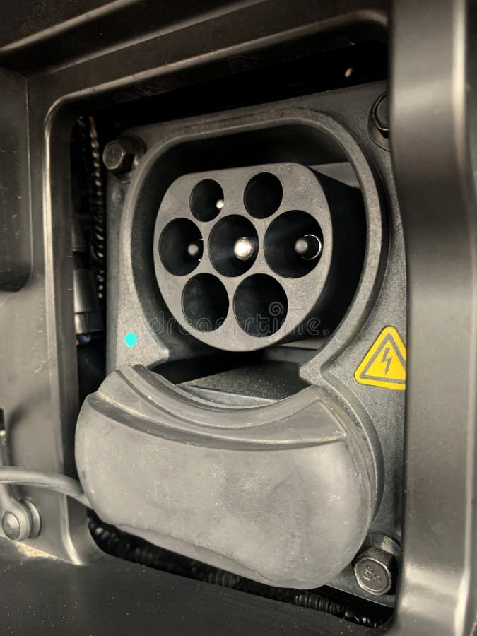 Charging electric vehicle stock image. Image of port - 169906917