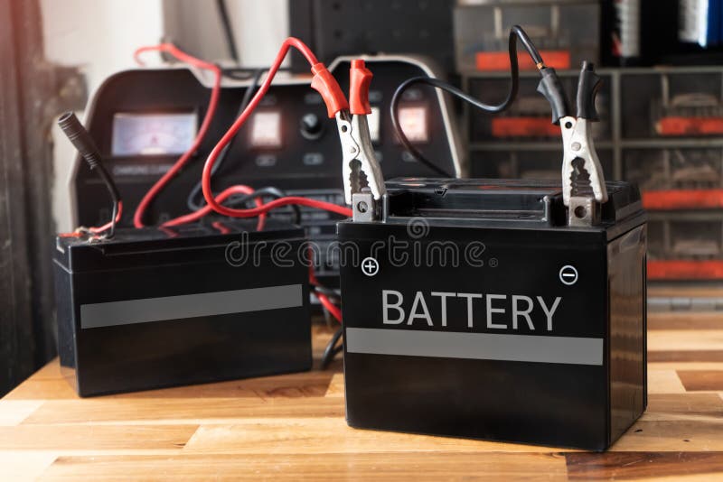 Charging Motorcycle Battery at Garage,concept of Motorcycle Maintenance ...