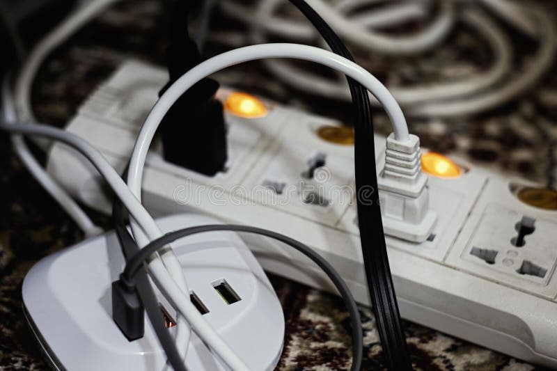Charging Multiple Electronic Devices on a Power Plug Stock Image ...
