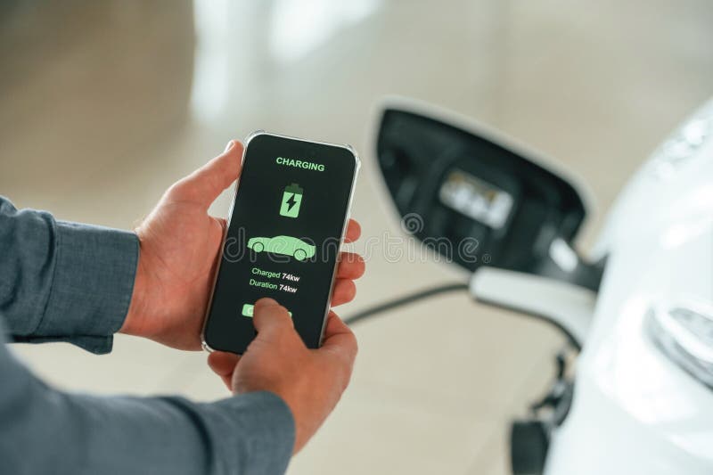 Charging Process on the Smartphone App. Close Up View of Man that is ...