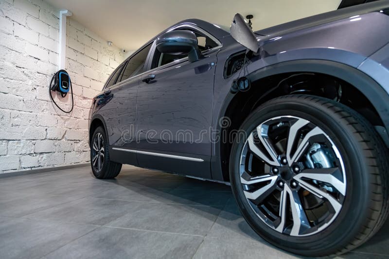 Charging Station of a Modern Electric Car. the Side of the Electric ...