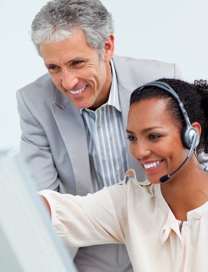 Charismatic Businessman Helping His Colleague Stock Photo - Image of ...