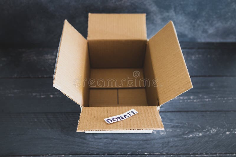 Charity Donation and Decluttering, Empty Box with Donate Label Ready To ...