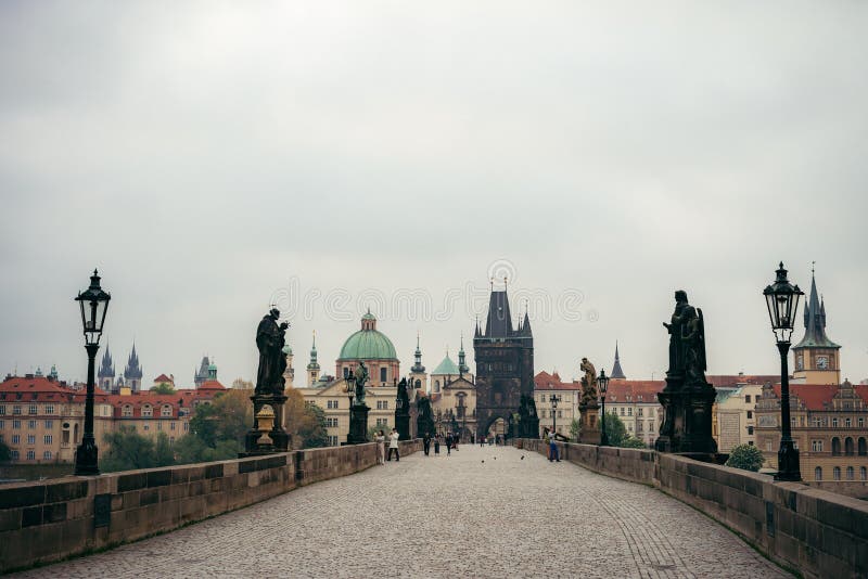 The Charles Bridge in Prague is Crowded with People during the Cloudy ...