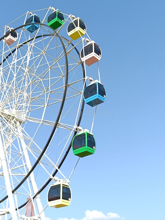 The Charm of a Festival with a Grand Ferris Wheel Stock Photo - Image ... The Charm of a Festival with a Grand Ferris Wheel Stock Photo - Image ...