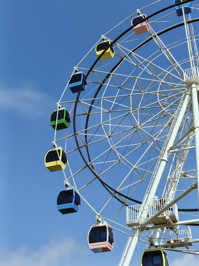 The Charm of a Festival with a Grand Ferris Wheel Stock Image - Image ... The Charm of a Festival with a Grand Ferris Wheel Stock Image - Image ...