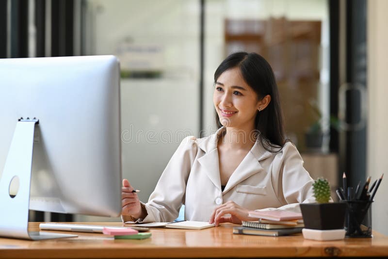 Charming Woman Working with Computer at Modern Office. Stock Image ...