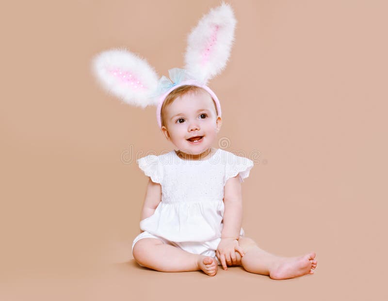 Charming Baby Sitting in Costume Easter Bunny Stock Photo - Image of ...
