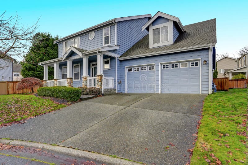 Charming Blue Two Story Home with a Nice Covered Porch. Stock Photo ...