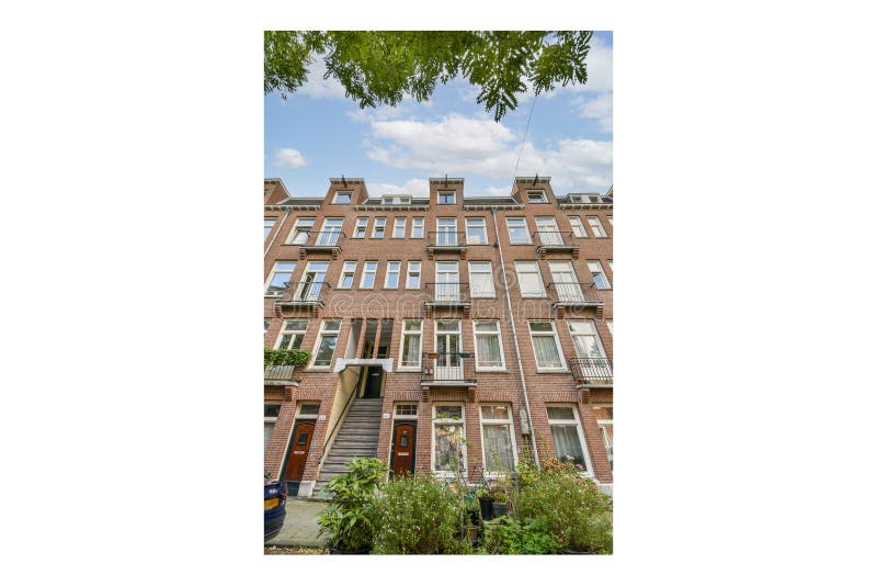 Charming Brick Building Facade Stock Photo - Image of plants, street ...