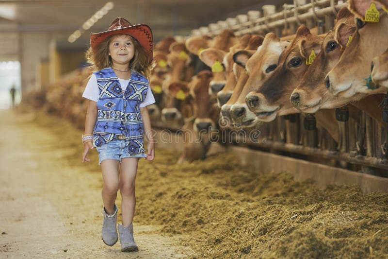 Charming Child in a Cowboy Costume on a Cows Farm in Denmark Stock ...